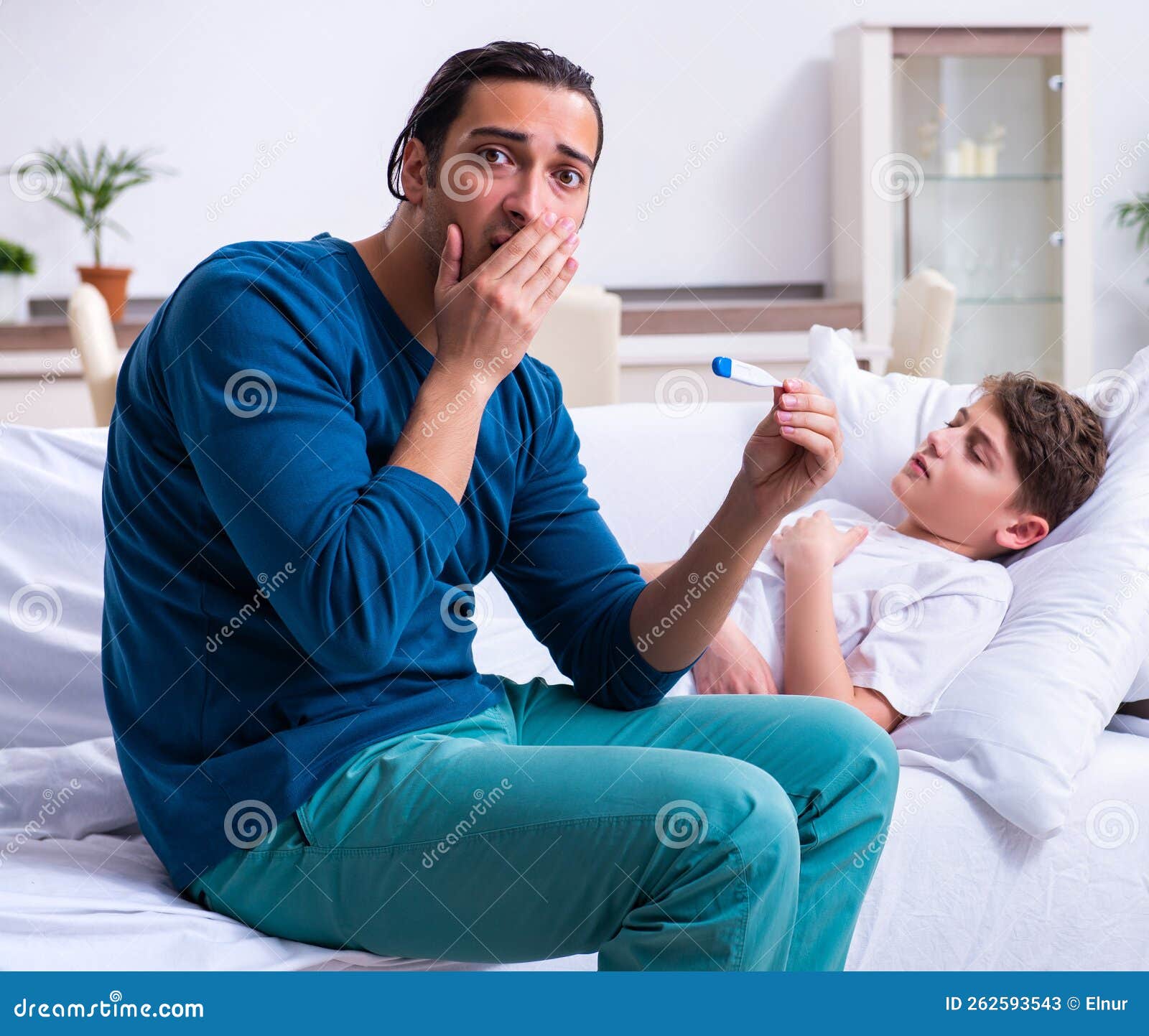 Young Father Caring for Sick Son Stock Image - Image of home, high ...