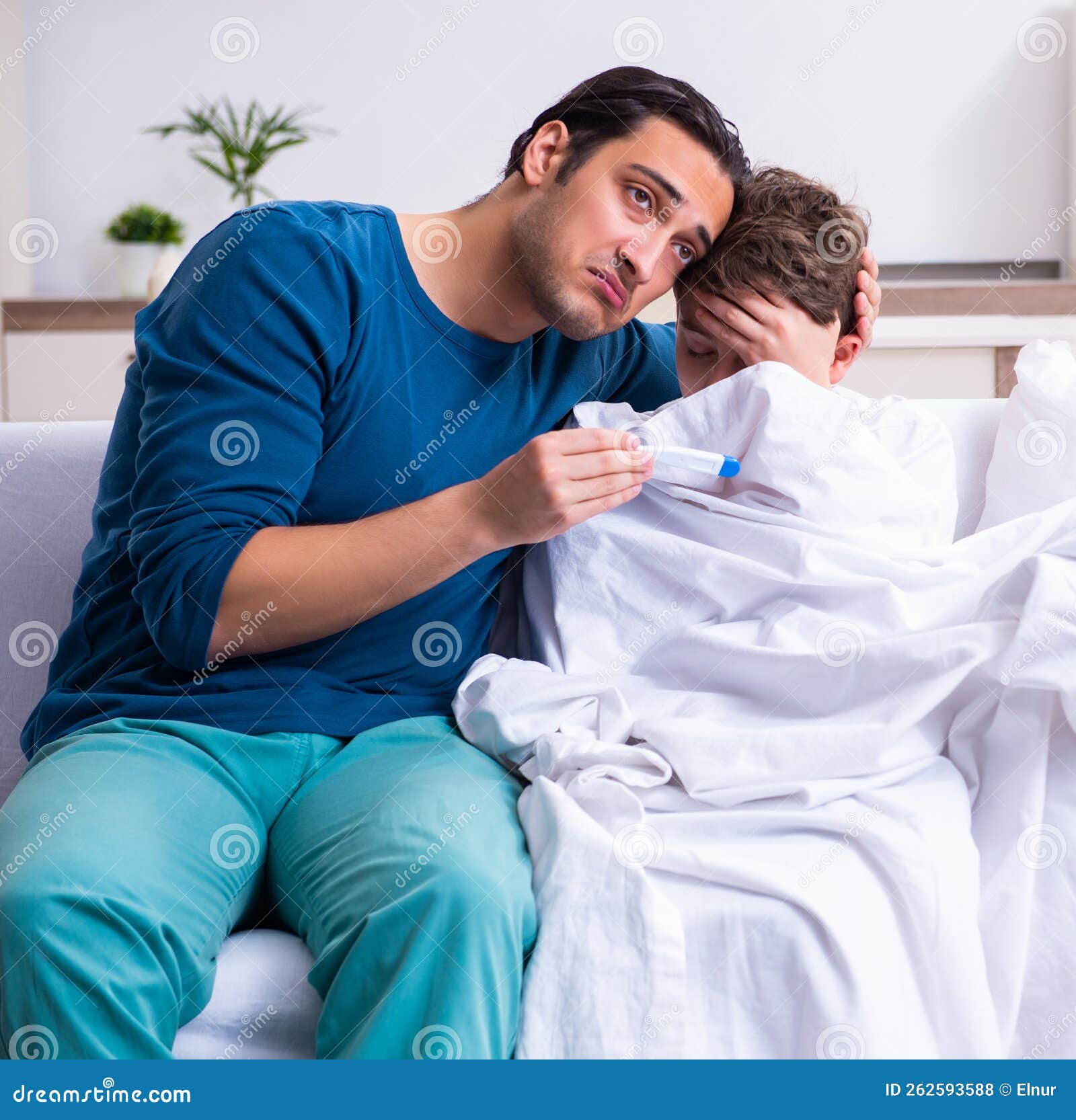 Young Father Caring for Sick Son Stock Photo - Image of allergy ...