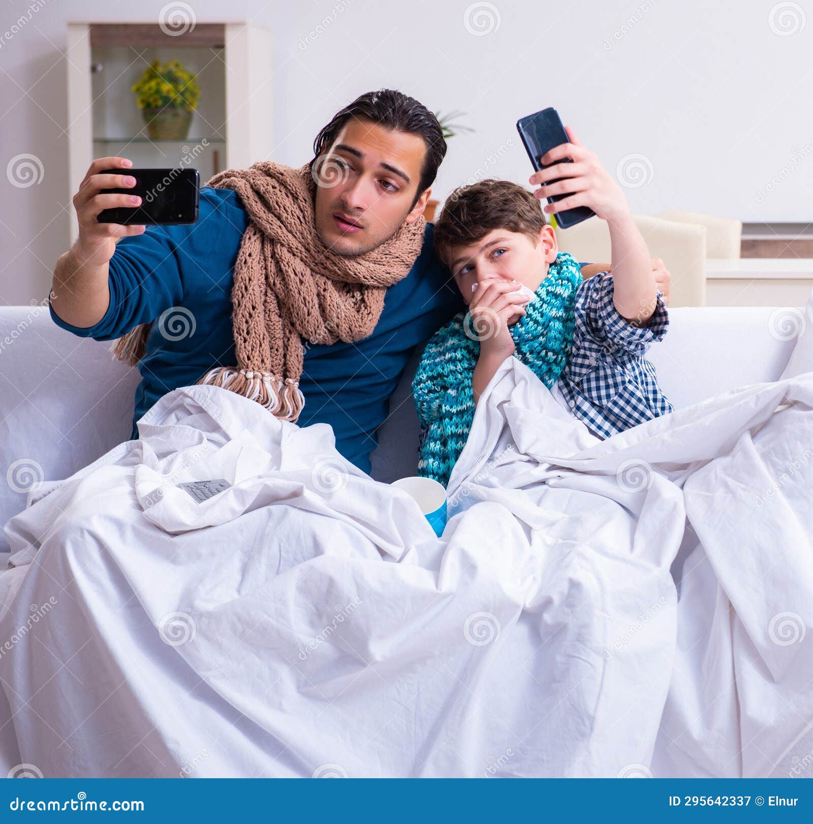 Young Father Caring for Sick Son Stock Image - Image of disease, family ...