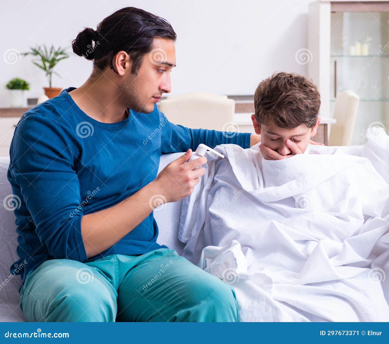 Young Father Caring for Sick Son Stock Image - Image of cold, care ...