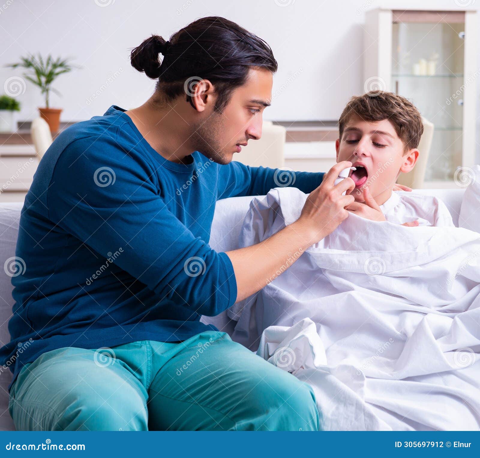 Young Father Caring for Sick Son Stock Photo - Image of high, aerosol ...