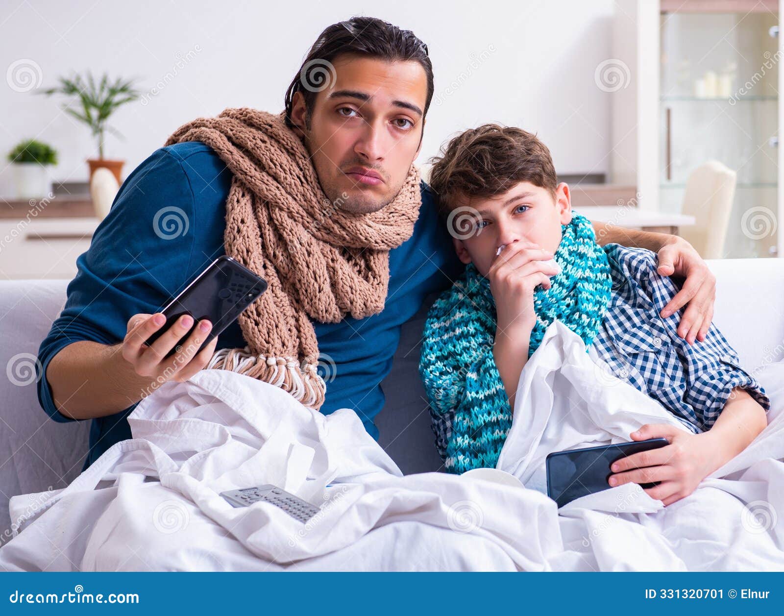 Young Father Caring for Sick Son Stock Image - Image of parent ...