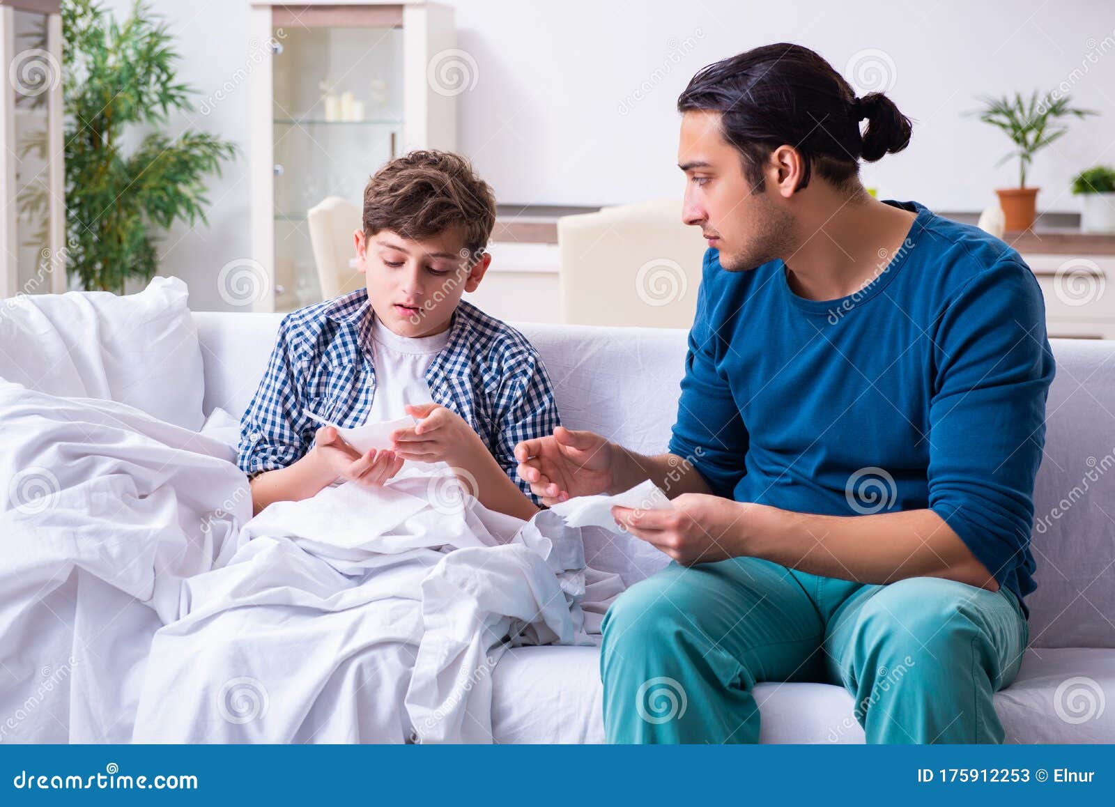 Young Father Caring for Sick Son Stock Image - Image of sneeze, blowing ...