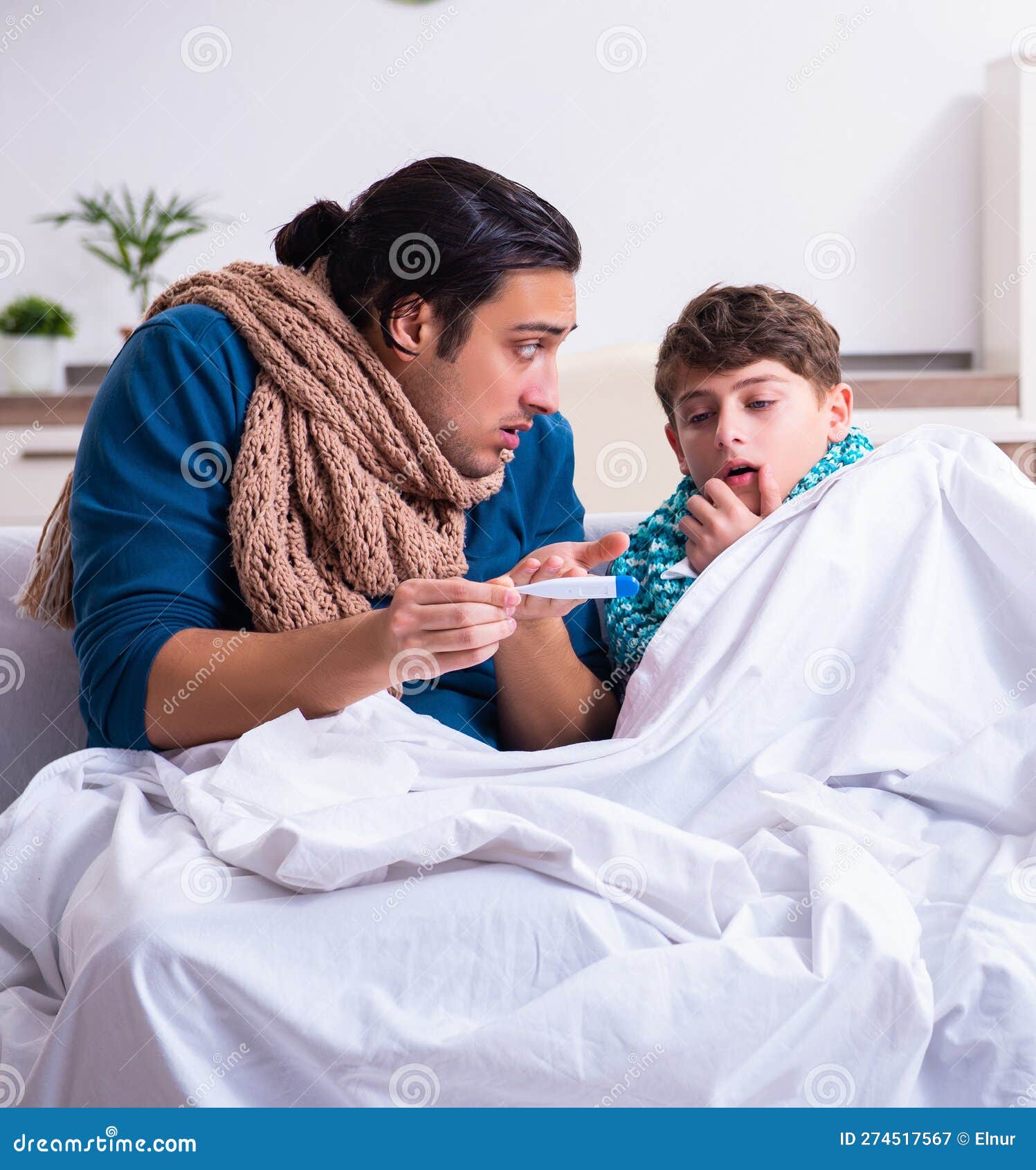 Young Father Caring for Sick Son Stock Image - Image of medical, panic ...
