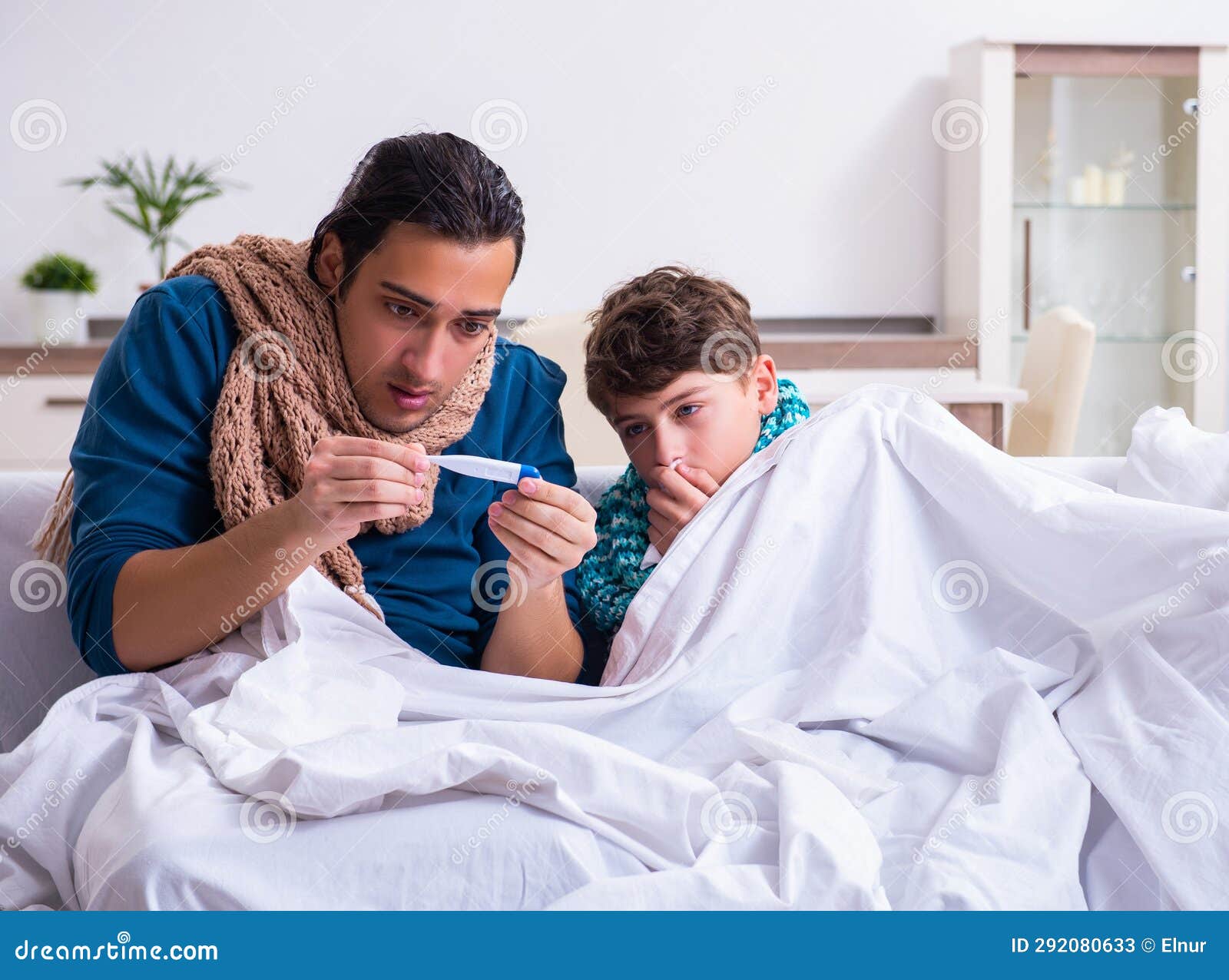 Young Father Caring for Sick Son Stock Image - Image of handkerchief ...