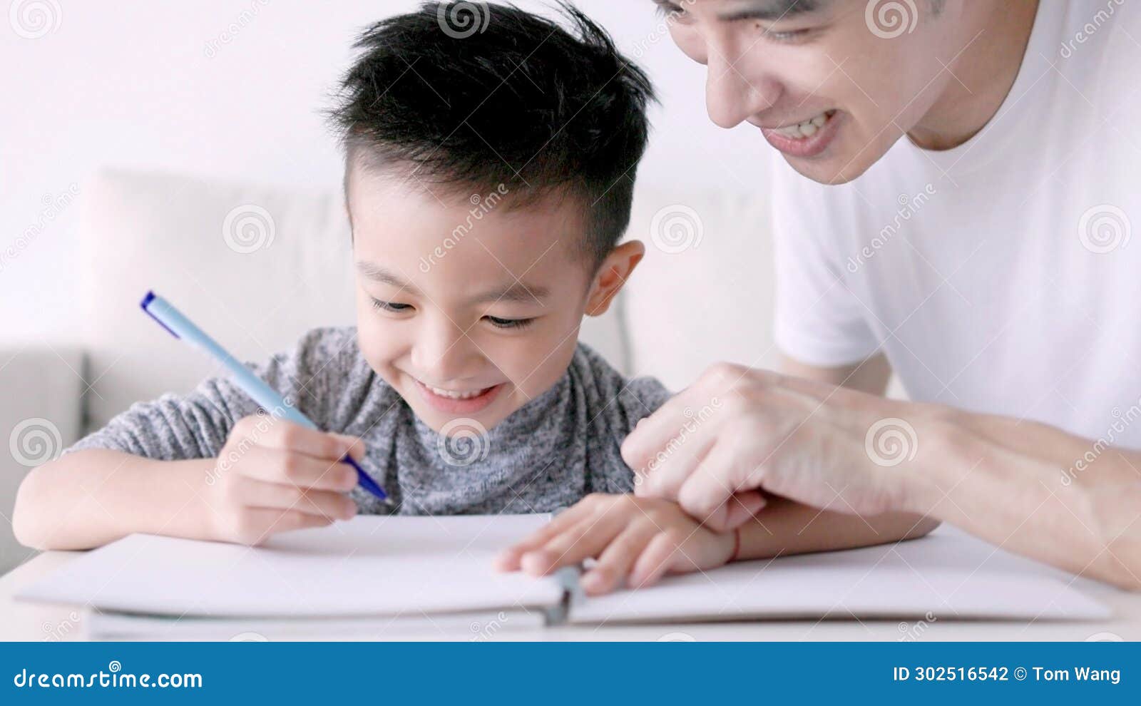 Young Father Checking Homework Helping Child with Study at Home Stock ...