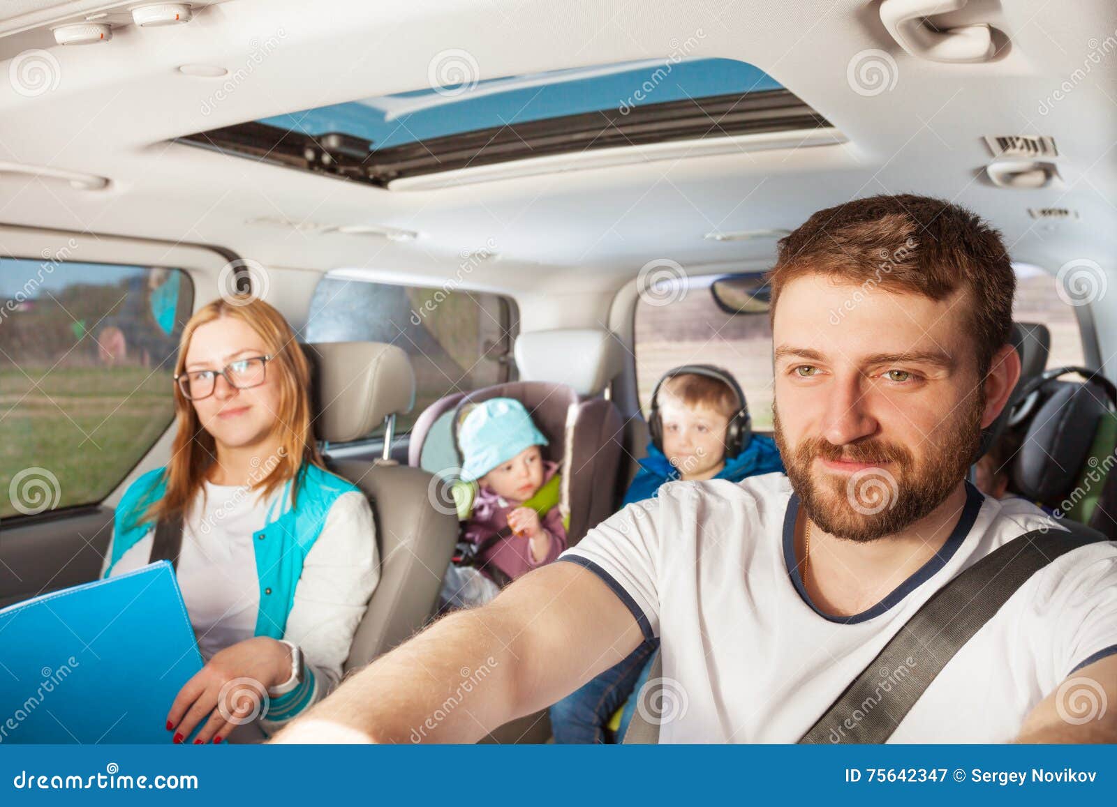 Young Father Driving His Family Car Stock Image - Image of mother ... Young Father Driving His Family Car Stock Image - Image of mother ...