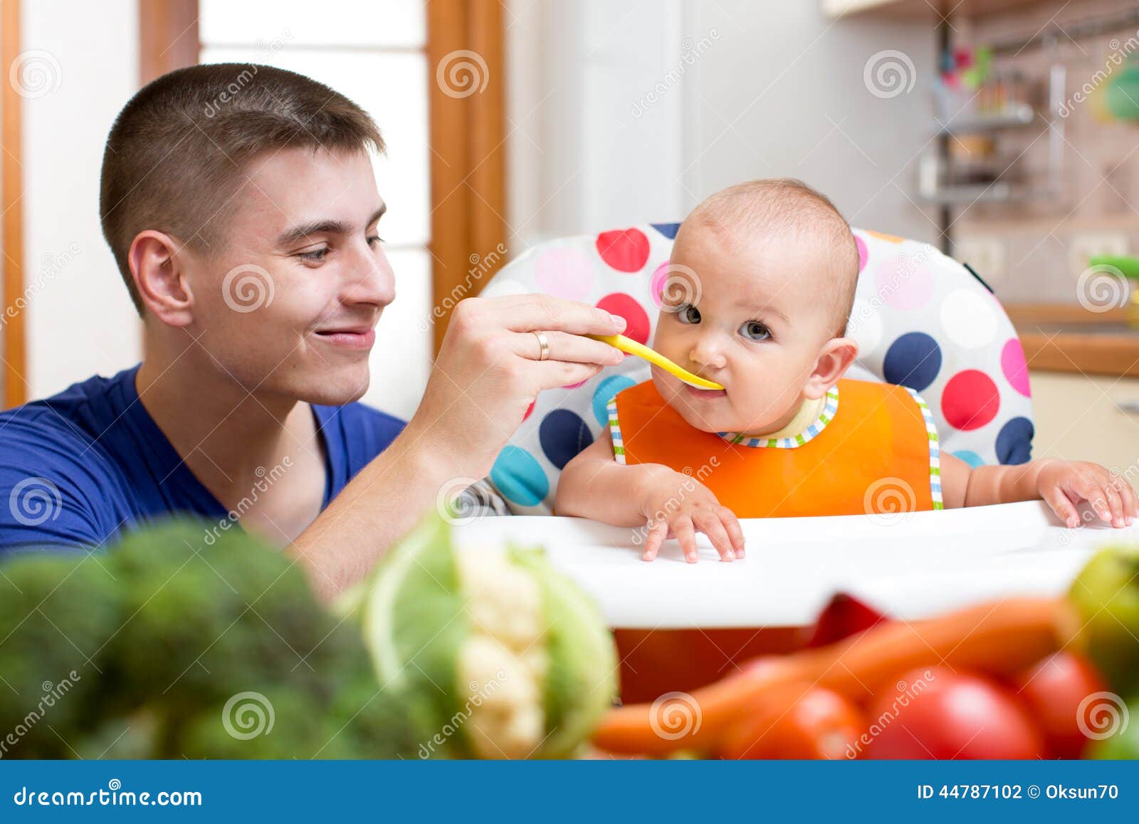 Young Father Feeding His Baby at Kitchen Stock Photo - Image of cute ...