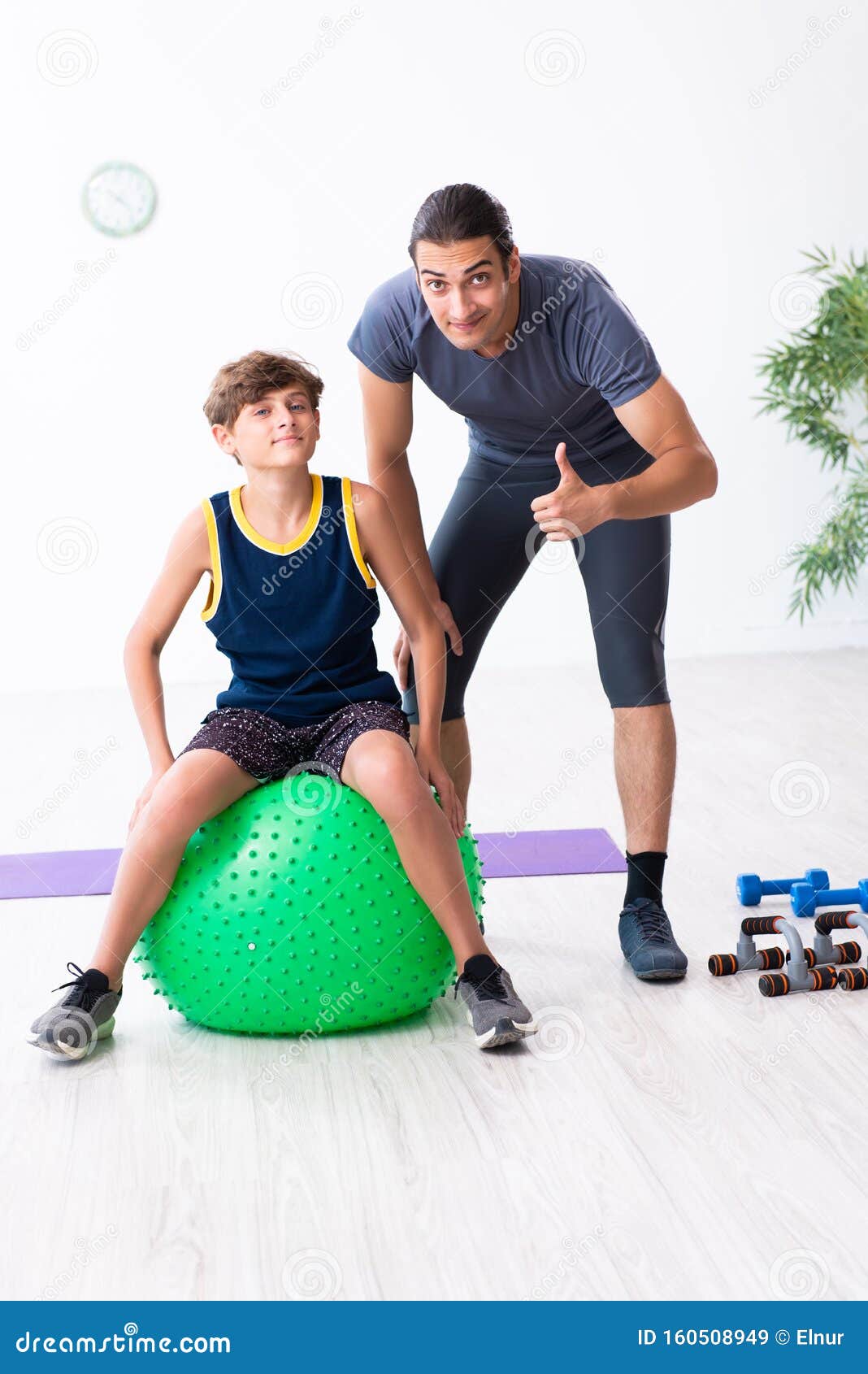 Young Father and His Son Doing Exercises Stock Image - Image of sport ...