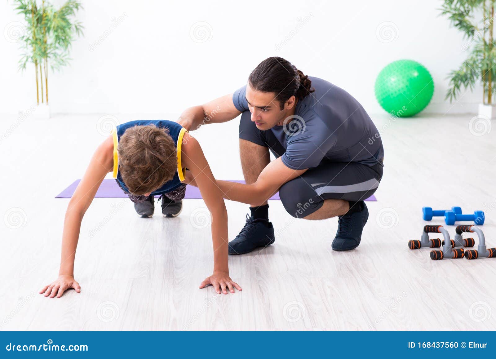 Young Father and His Son Doing Exercises Stock Photo - Image of ...