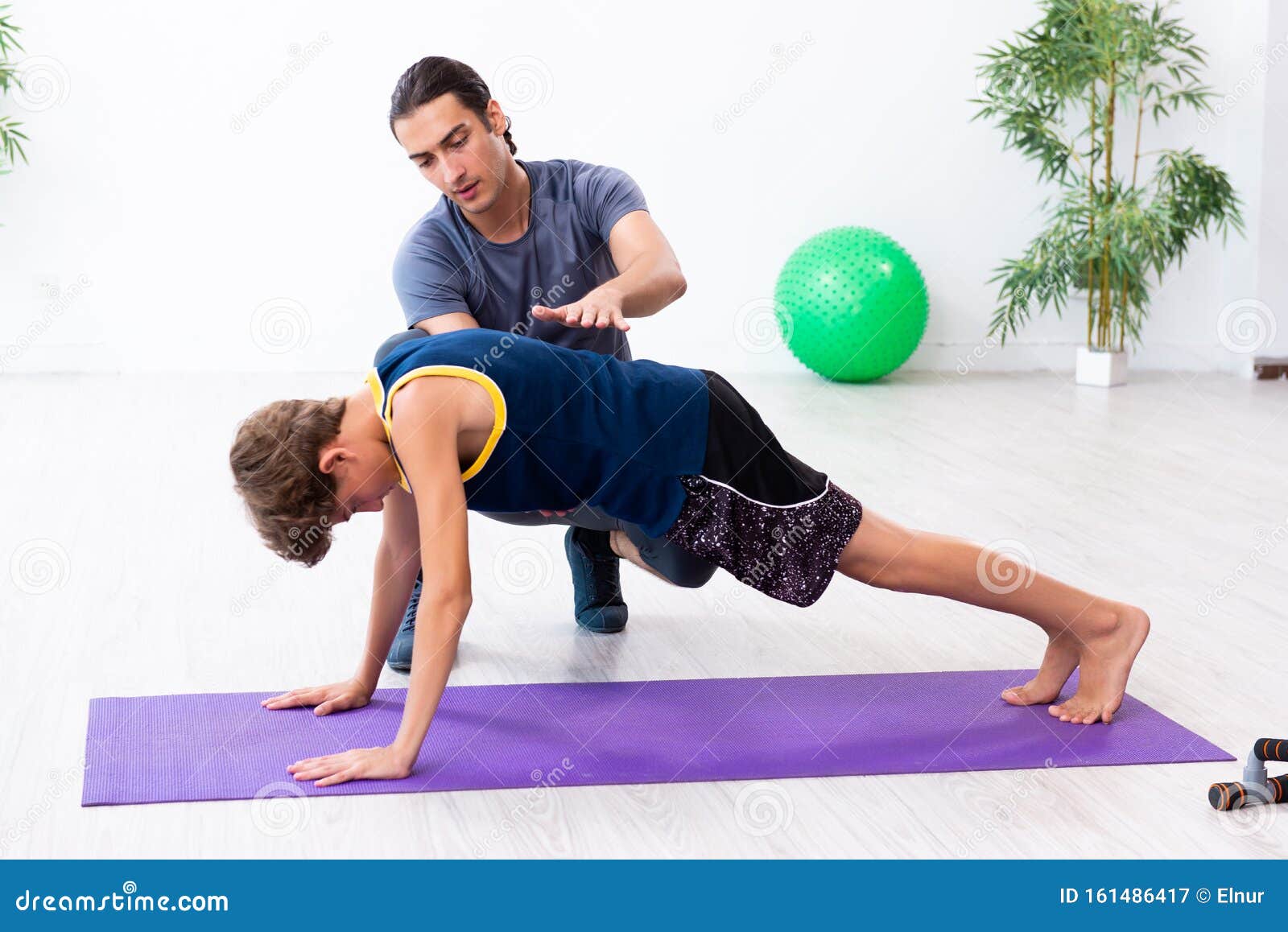 Young Father and His Son Doing Exercises Stock Image - Image of coach ...