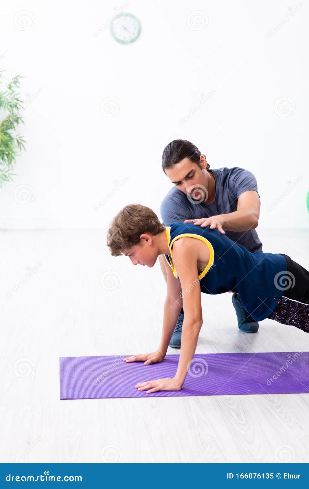 Young Father and His Son Doing Exercises Stock Image - Image of floor ...