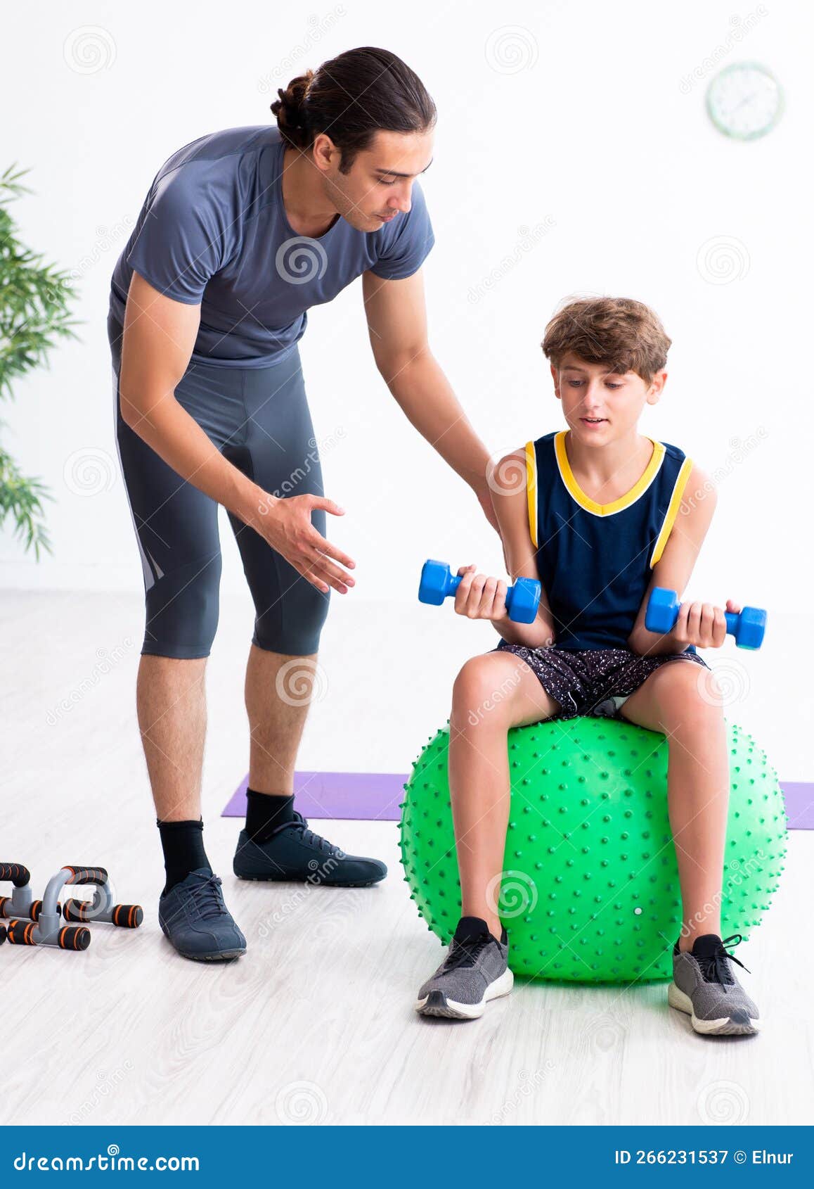 Young Father and His Son Doing Exercises Stock Image - Image of body ...