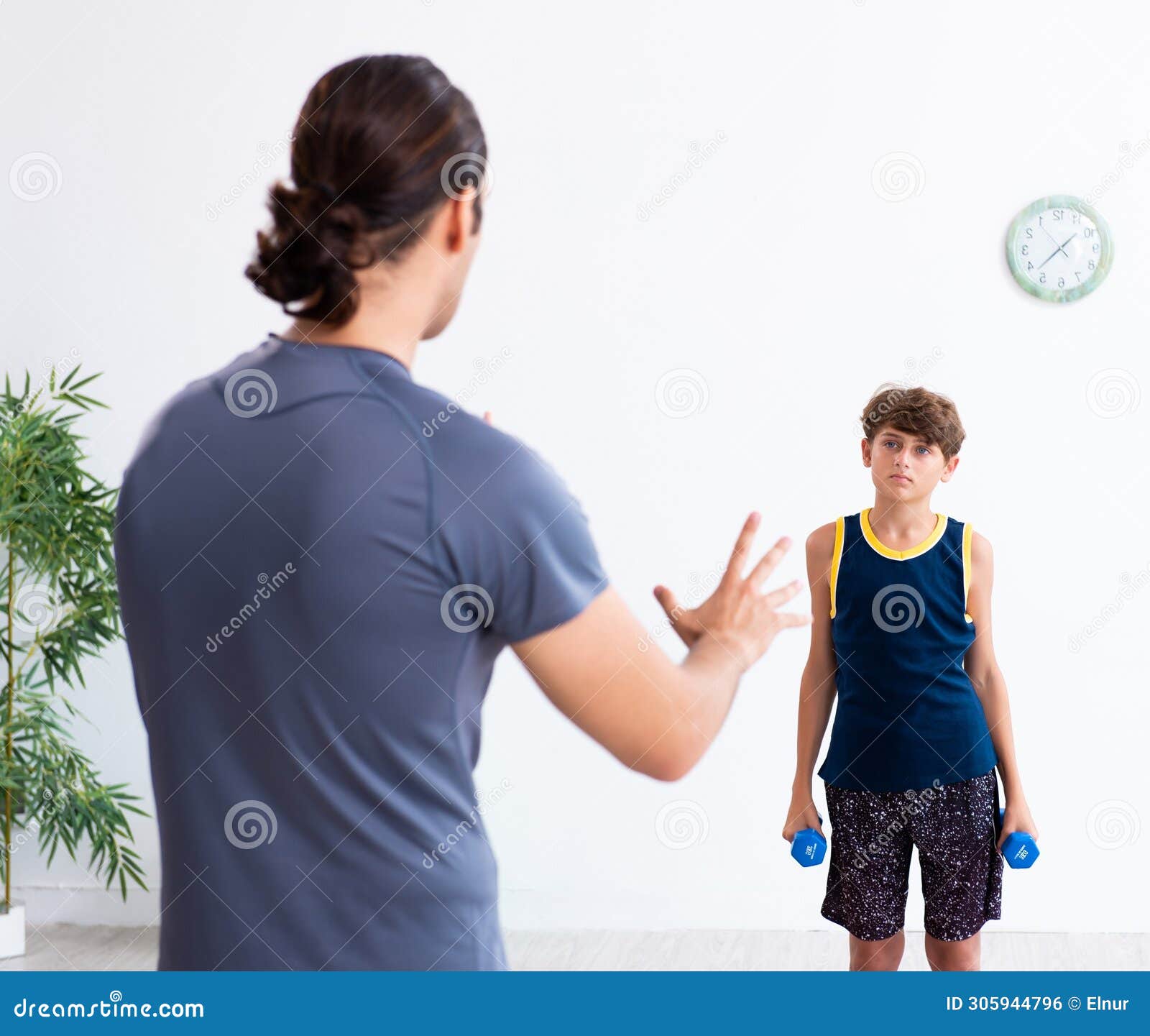 Young Father and His Son Doing Exercises Stock Photo - Image of active ...
