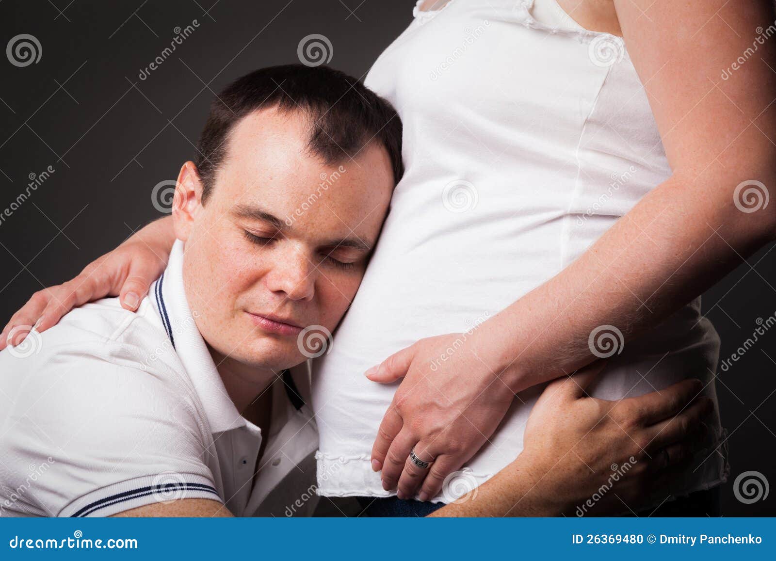 Young Father Listen To Belly Stock Photo - Image of husband, love: 26369480