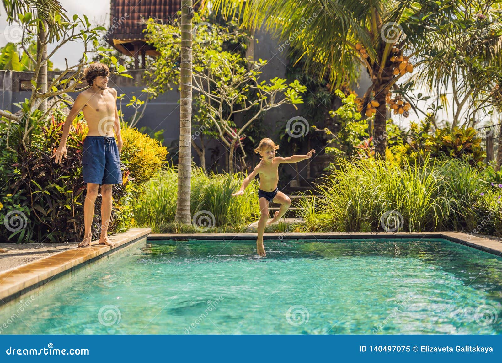 Young Father with Little Son Playing in the Pool Stock Image - Image of ...