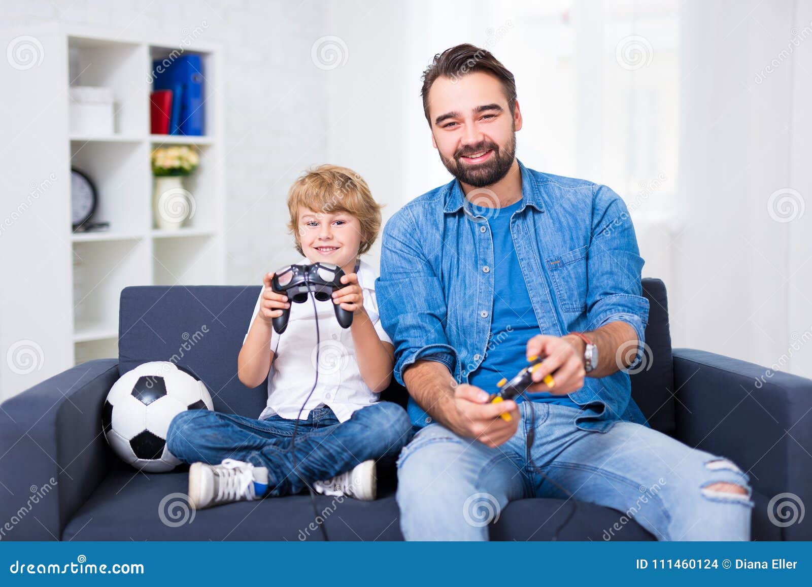 Young Father and Son Playing Video Games at Home Stock Photo - Image of ...