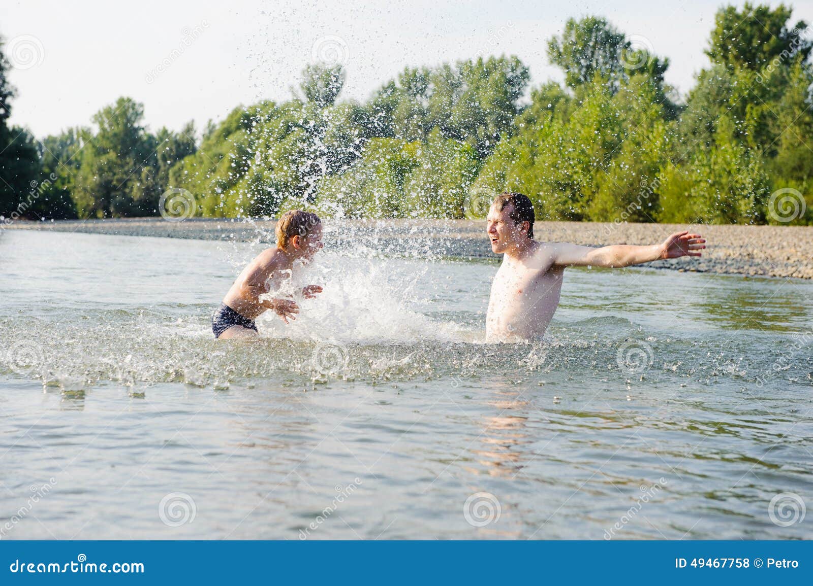 Young Father and Son Swimming in River Stock Photo - Image of river ...