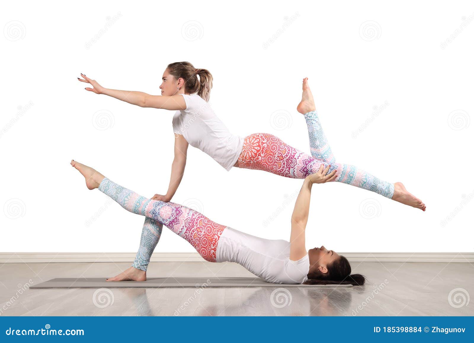 Young Female Acrobats in Beautiful Acrobatic Poses Stock Photo - Image ...