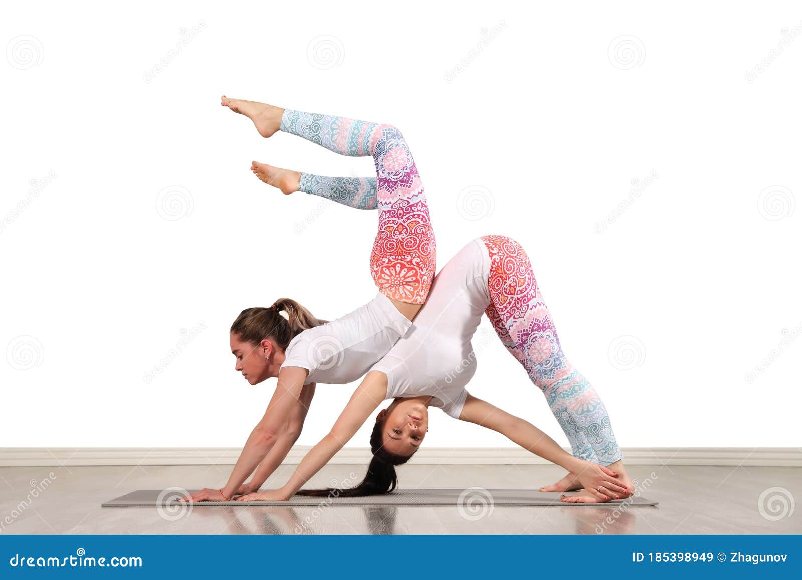 Young Female Acrobats in Beautiful Acrobatic Poses Stock Image - Image ...