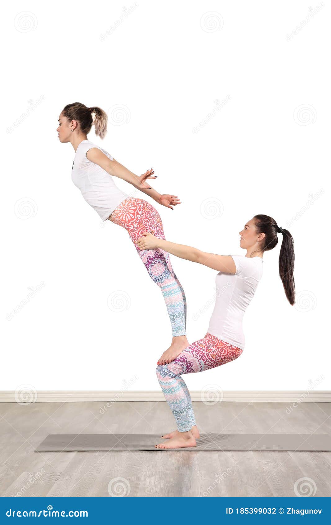 Young Female Acrobats in Beautiful Acrobatic Poses Stock Photo - Image ...