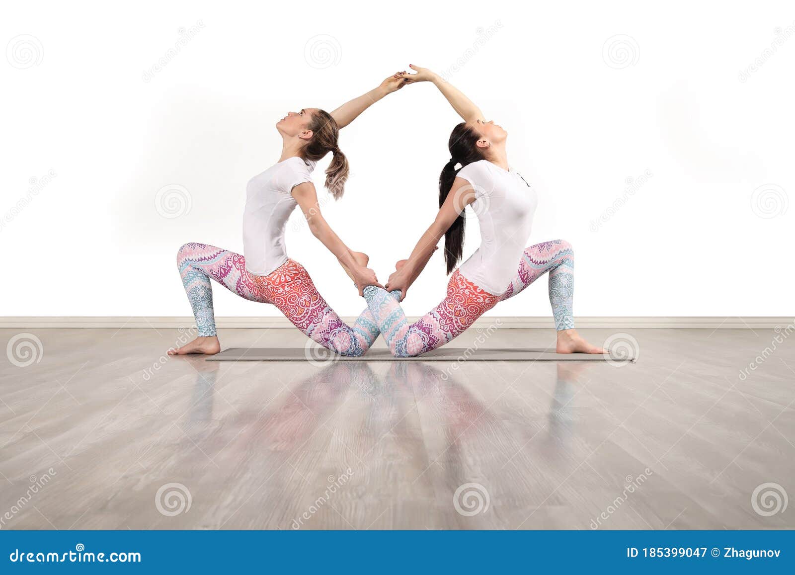 Young Female Acrobats in Beautiful Acrobatic Poses Stock Image - Image ...