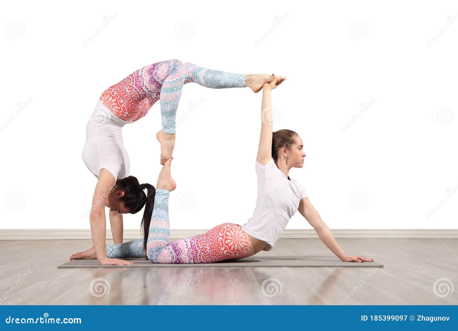 Young Female Acrobats in Beautiful Acrobatic Poses Stock Image - Image ...