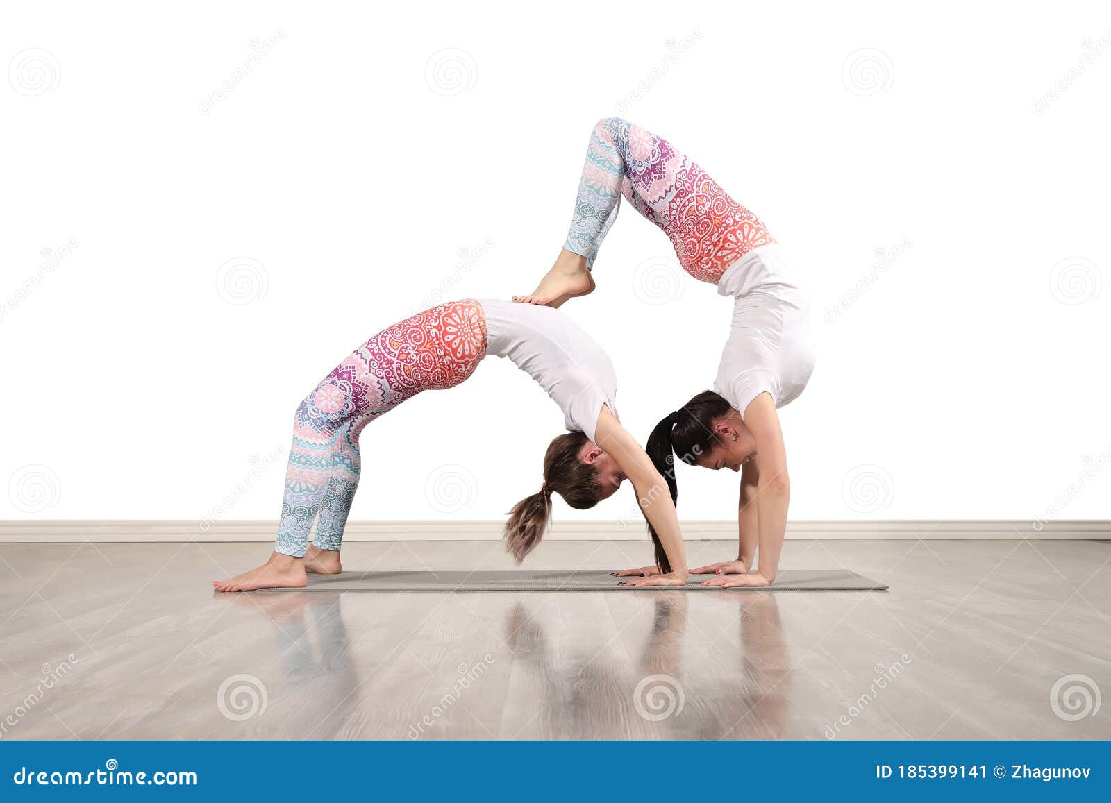 Young Female Acrobats in Beautiful Acrobatic Poses Stock Image - Image ...