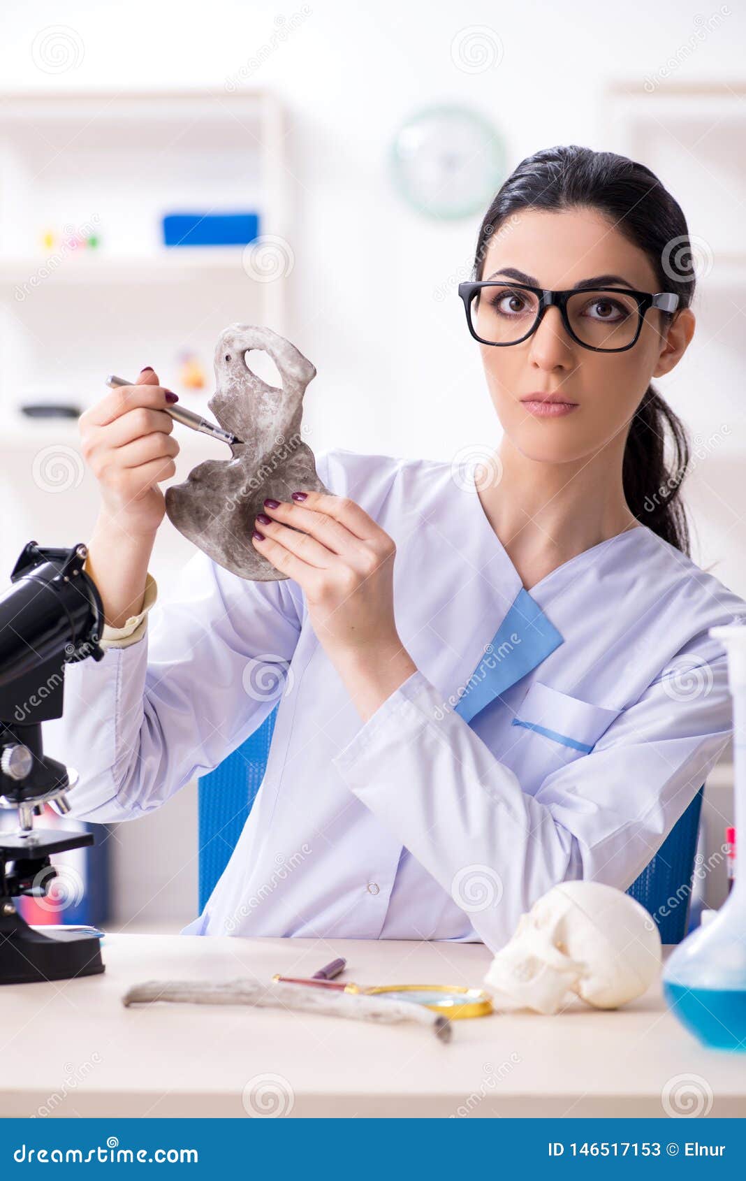 The Young Female Archaeologist Working in the Lab Stock Image - Image ...