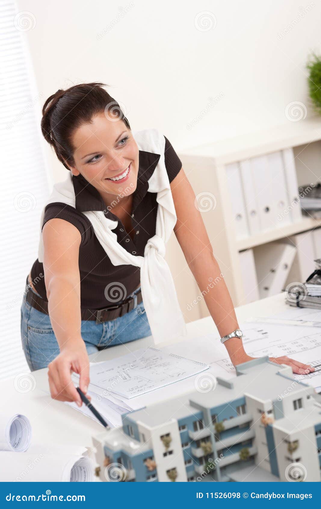 Young Female Architect with Architectural Model Stock Photo - Image of ...