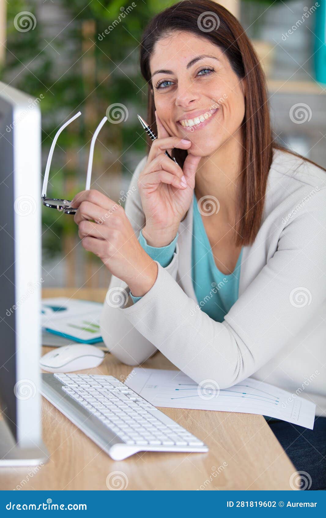 Young Female Architect Working with Computer and Blueprints Stock Photo ... Young Female Architect Working with Computer and Blueprints Stock Photo ...