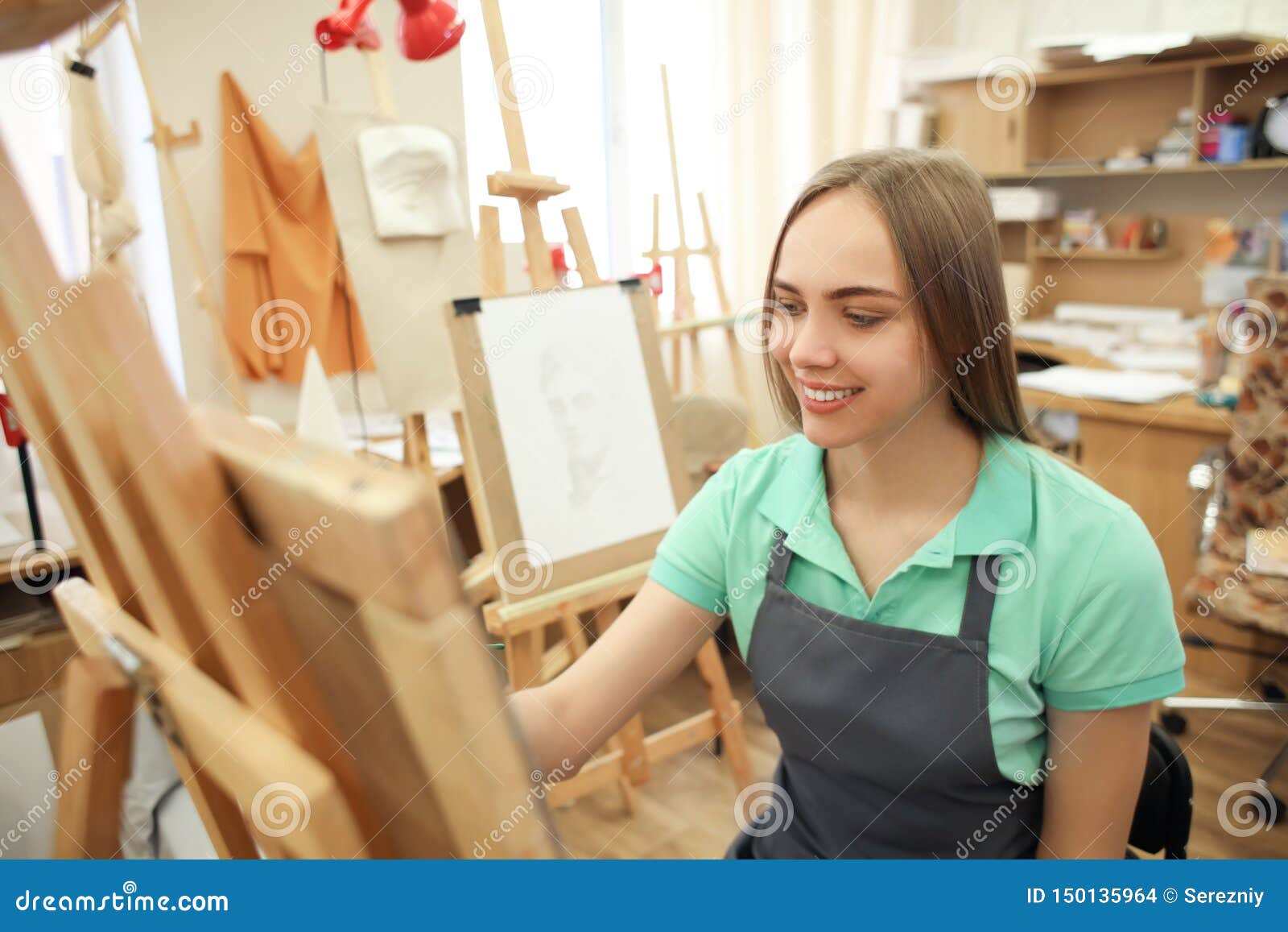 Young Female Art Student Painting in Workshop Stock Photo - Image of ...
