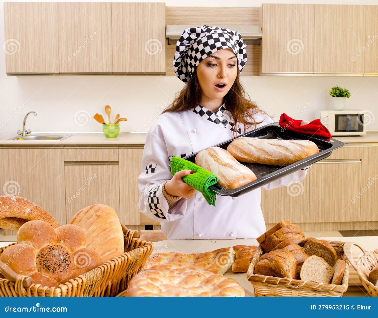 Young Female Baker Working in Kitchen Stock Image - Image of dough ...