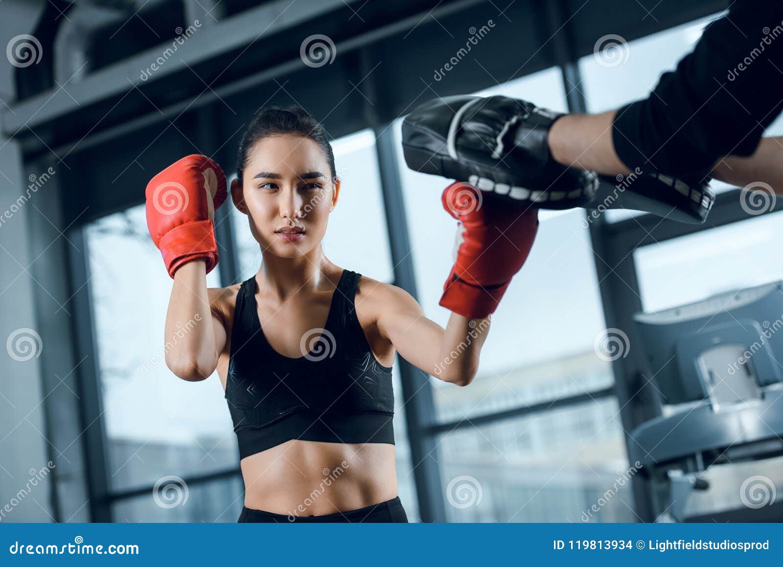 Young Female Boxer Exercising with Trainer Stock Photo - Image of boxer ...