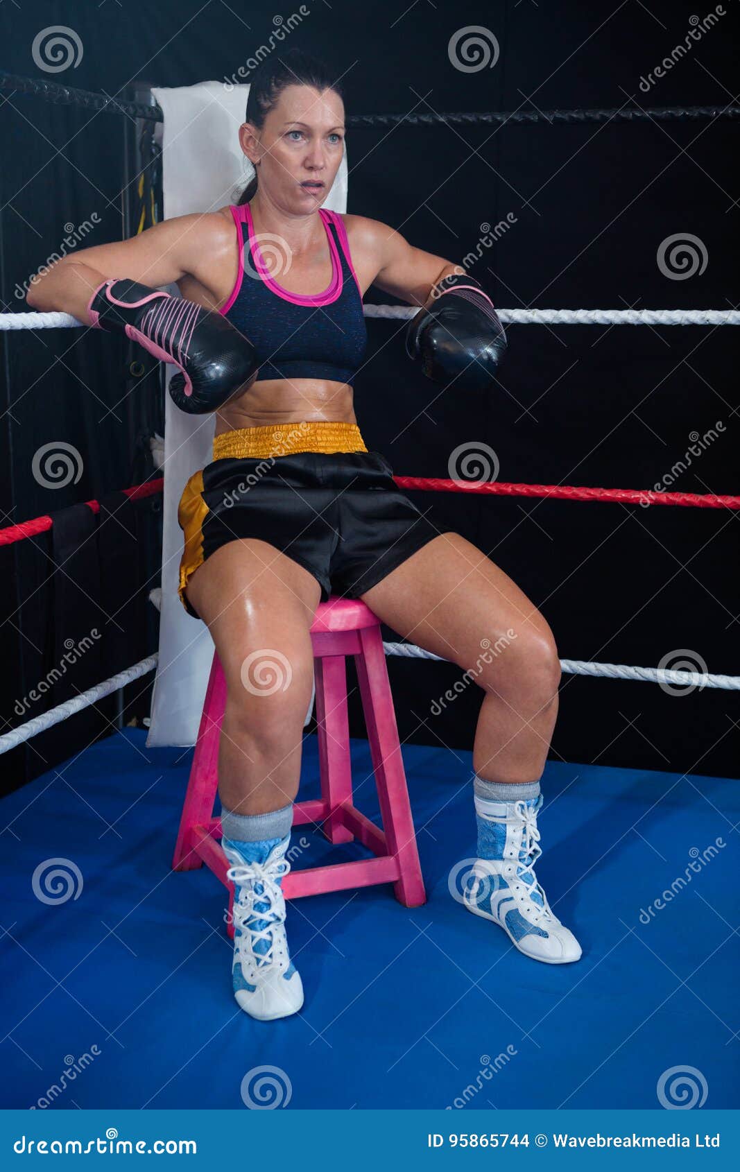 Young Female Boxer Sitting on Stool at Corner Stock Photo - Image of ...