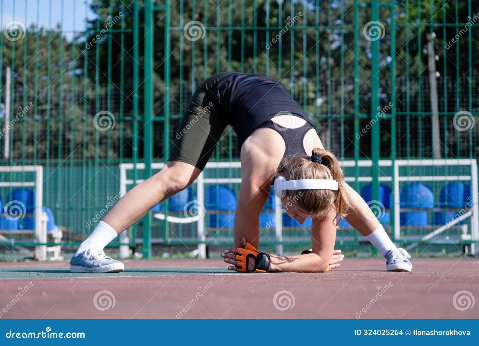 Young Female Boxer Training in the Stadium Warming Up Stock Photo ...