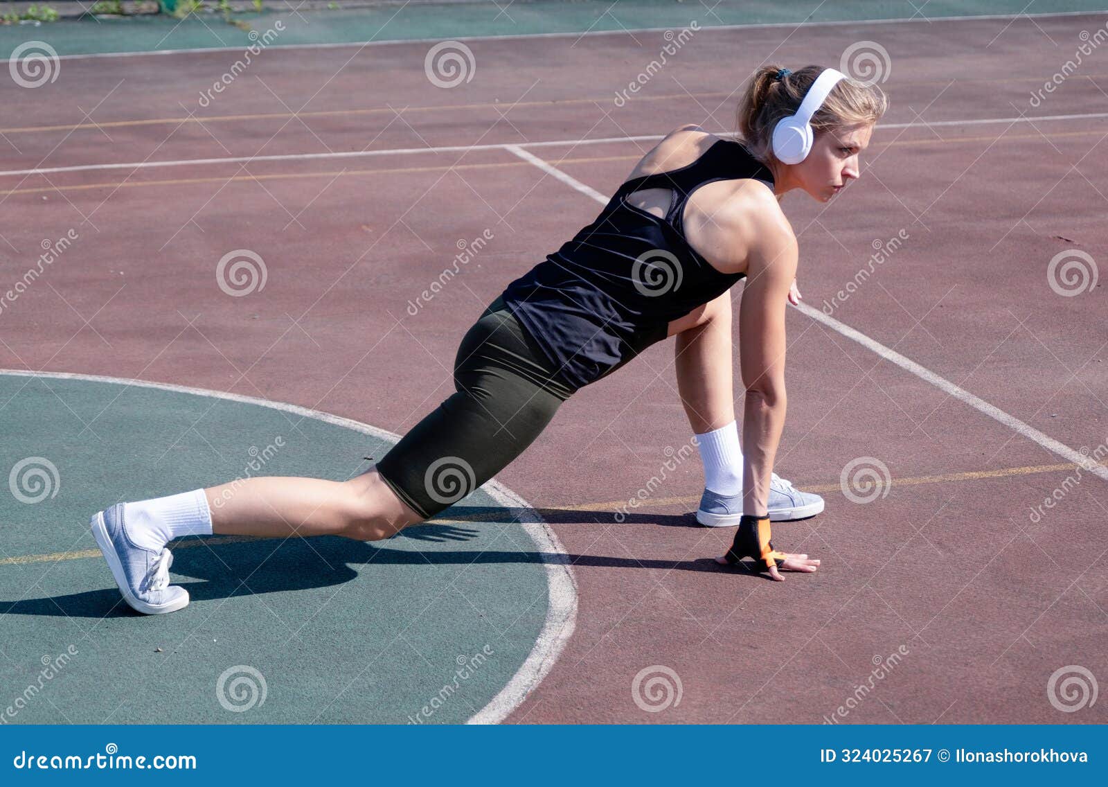 Young Female Boxer Training in the Stadium Warming Up Stock Image ...