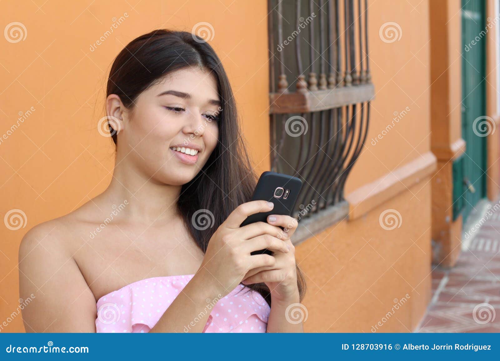 Young Female Browsing on Her Cellphone Stock Photo - Image of people ...