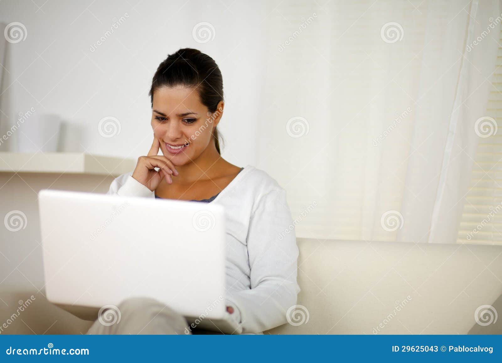 Young Female Browsing the Internet on Laptop Stock Image - Image of ...