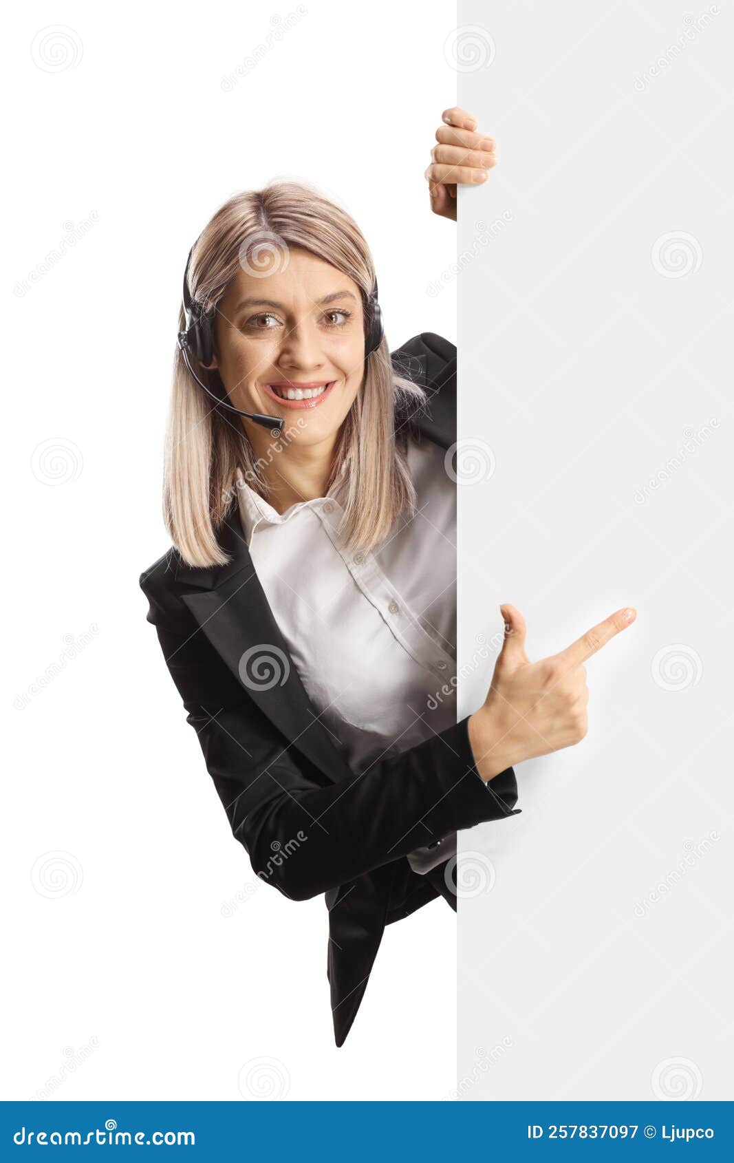 Young Female Call Operator Standing Behind a Blank White Board and ...