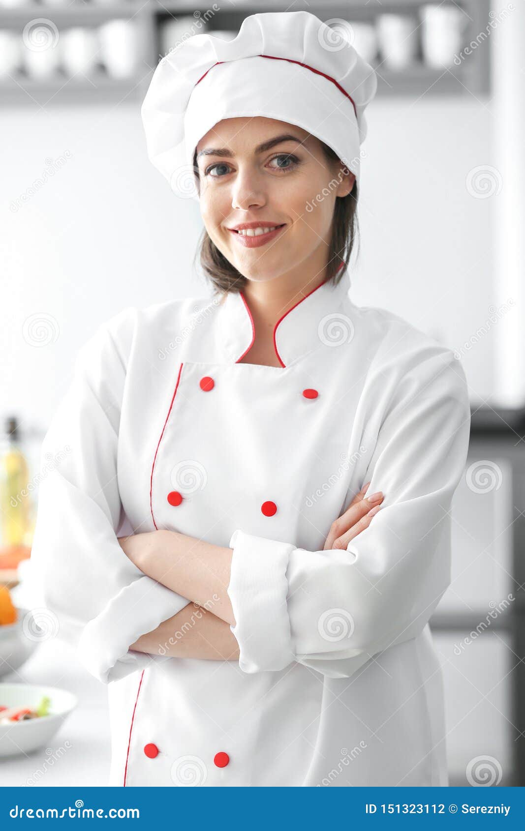 Young Female Chef in Kitchen Stock Photo - Image of arms, people: 151323112