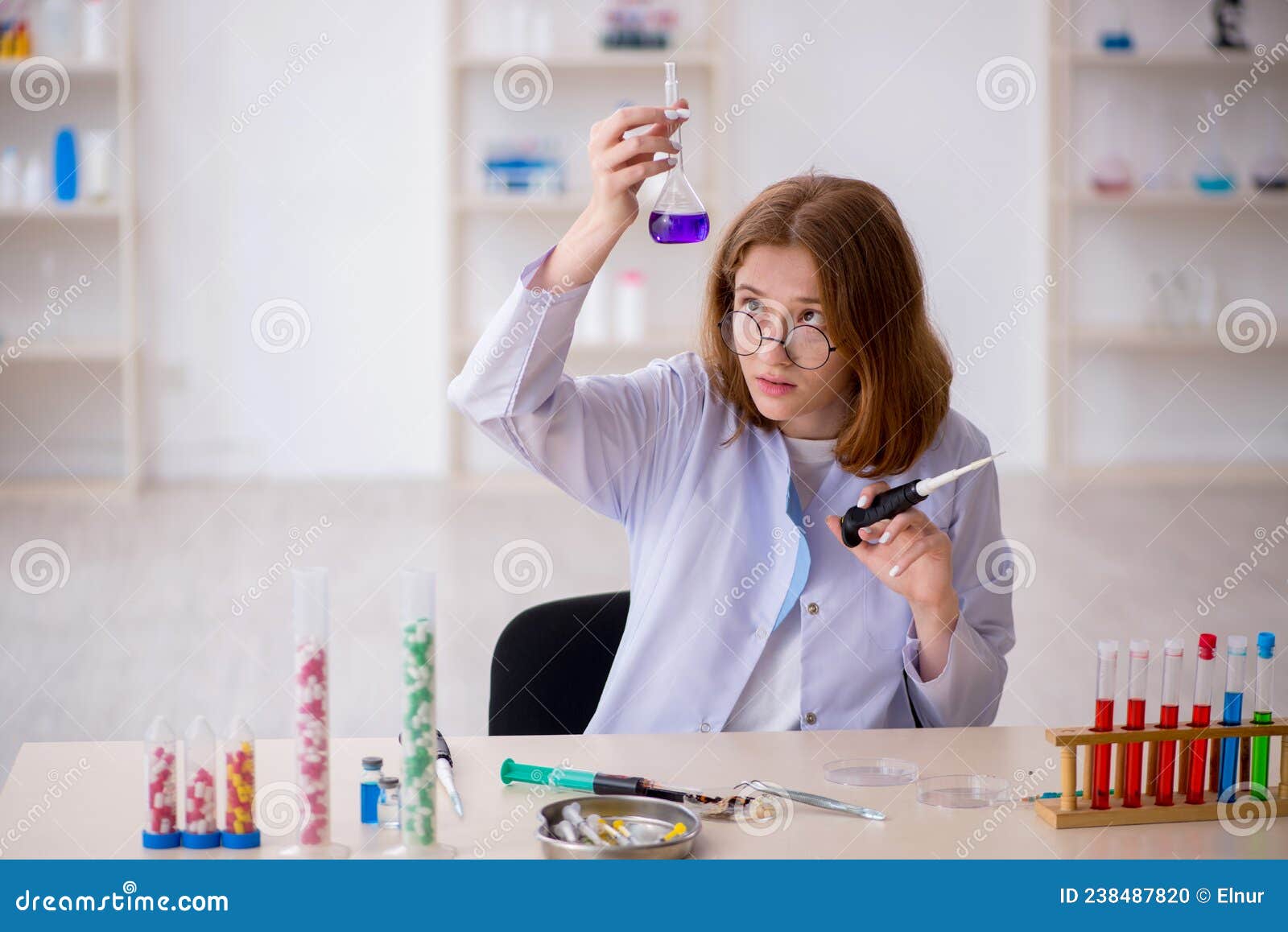Young Female Chemist Working at the Lab Stock Photo - Image of biology ...