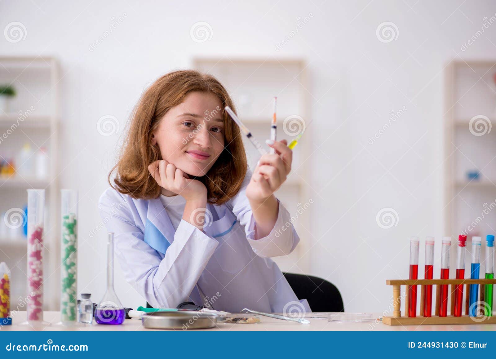Young Female Chemist Working at the Lab Stock Photo - Image of showing ...