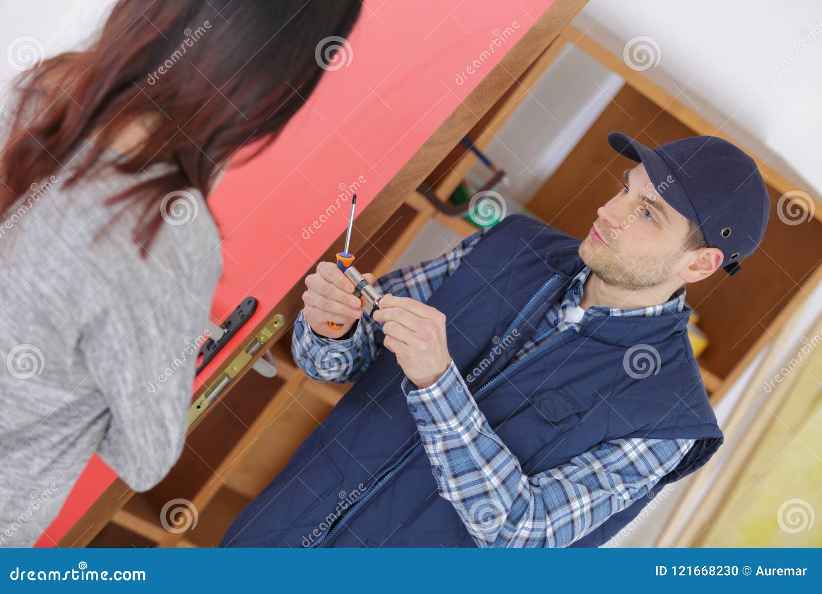 Young Female Client Talking with Locksmith Stock Photo - Image of ...
