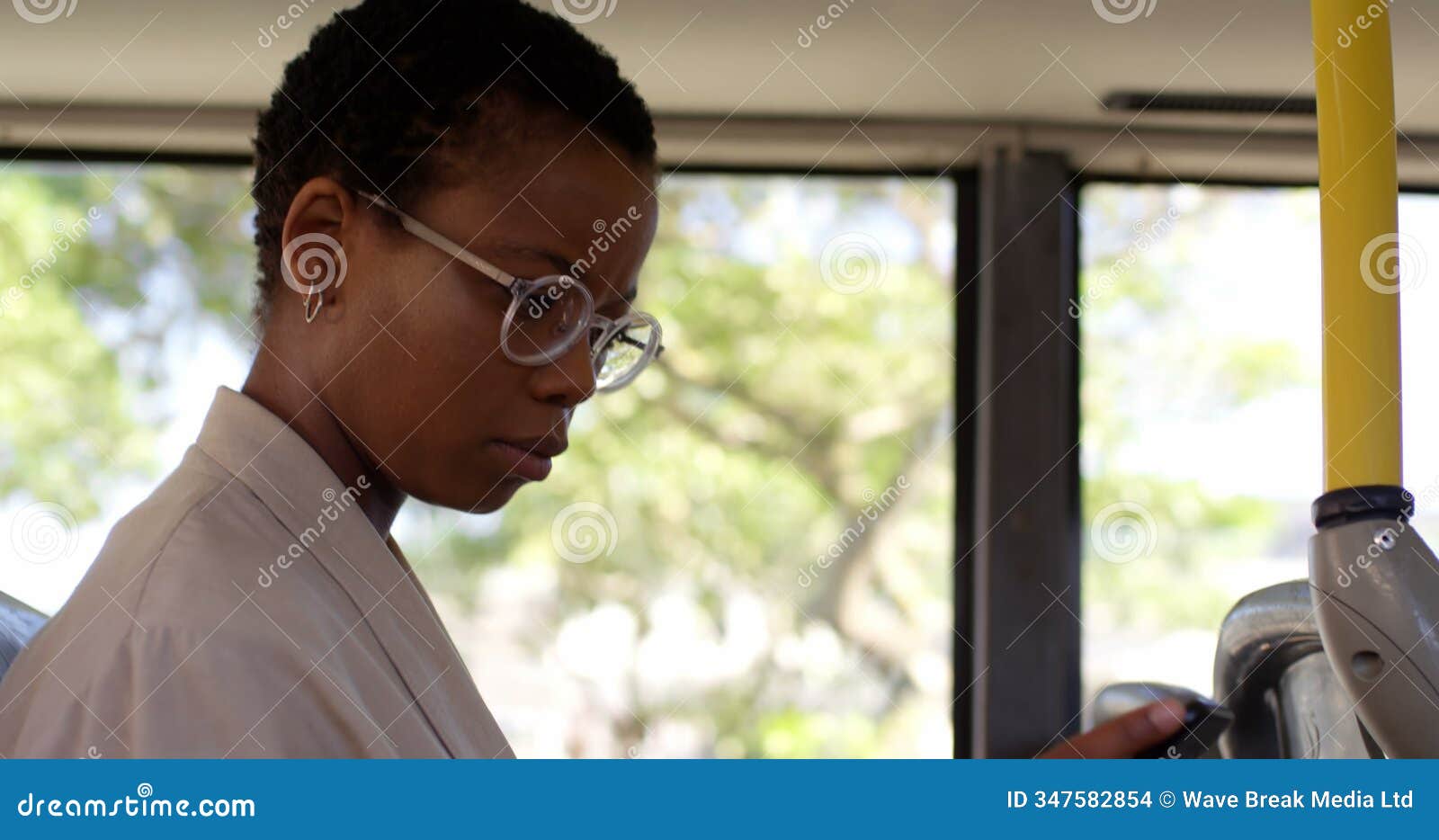Young Female Commuter Using Mobile Phone while Travelling in Bus 4k ...
