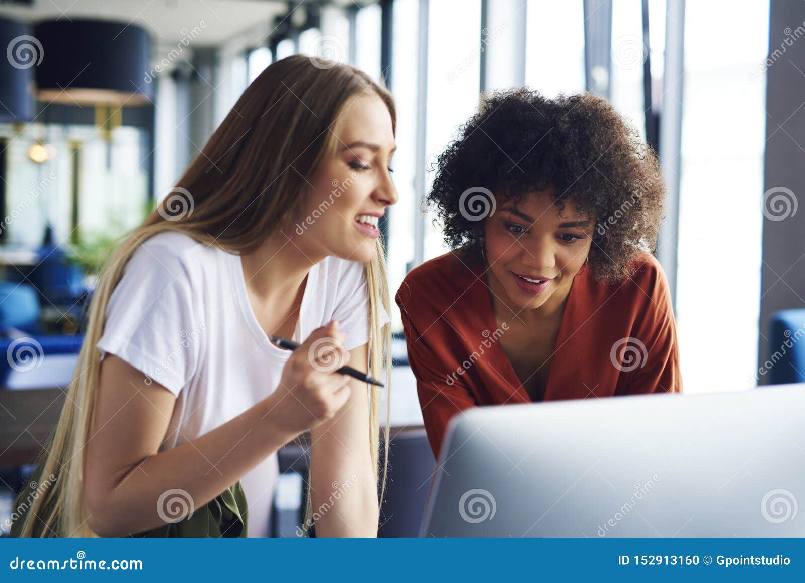 Young Coworkers Working on Computer Stock Photo - Image of person ...