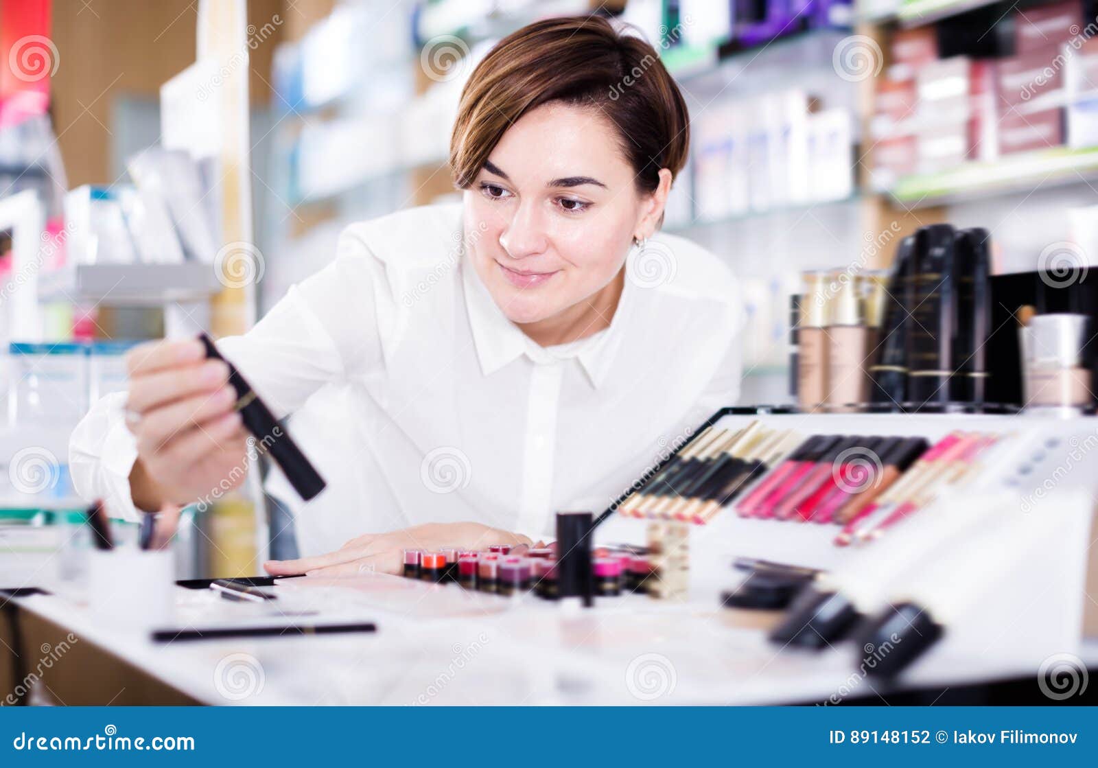 Young Female Customer Looking for Make-up Items Stock Photo - Image of ...