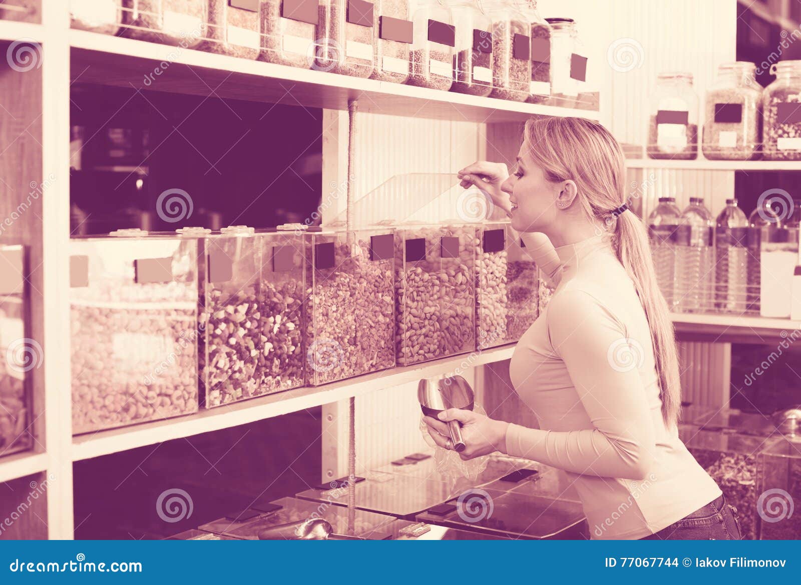 Young Female Customer Selecting Various Nuts Stock Photo - Image of ...