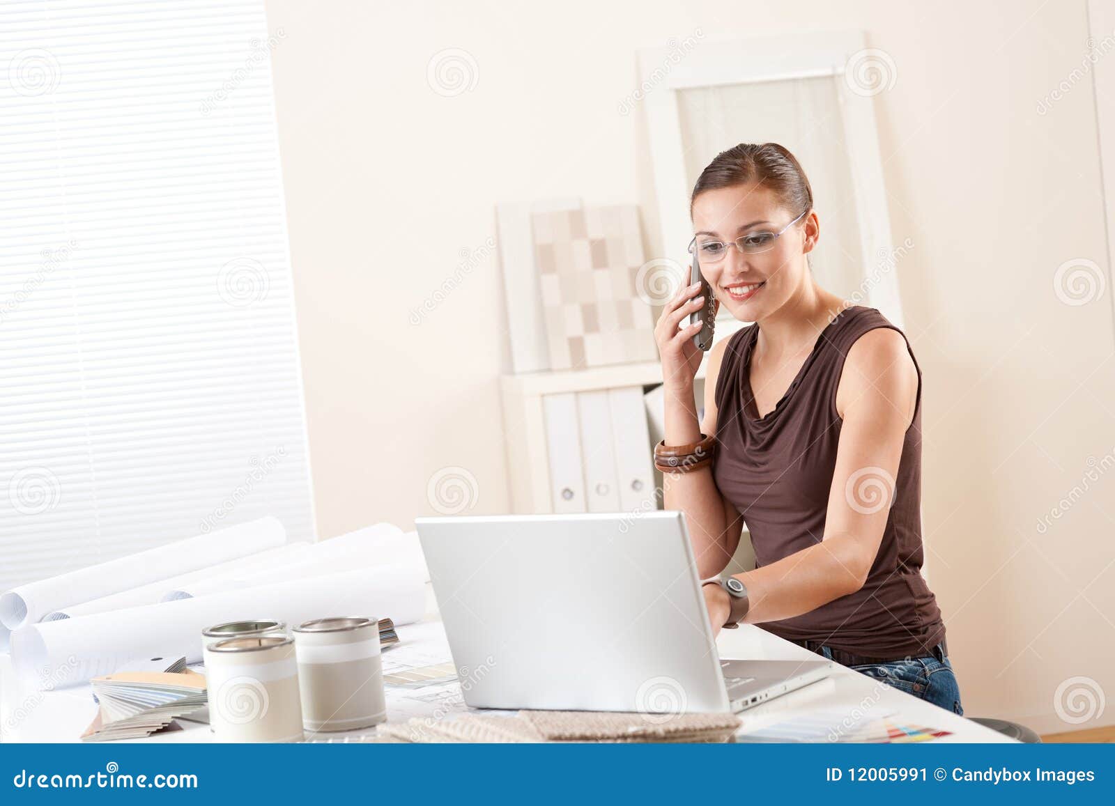 Young Female Designer on the Phone at Office Stock Image - Image of ...