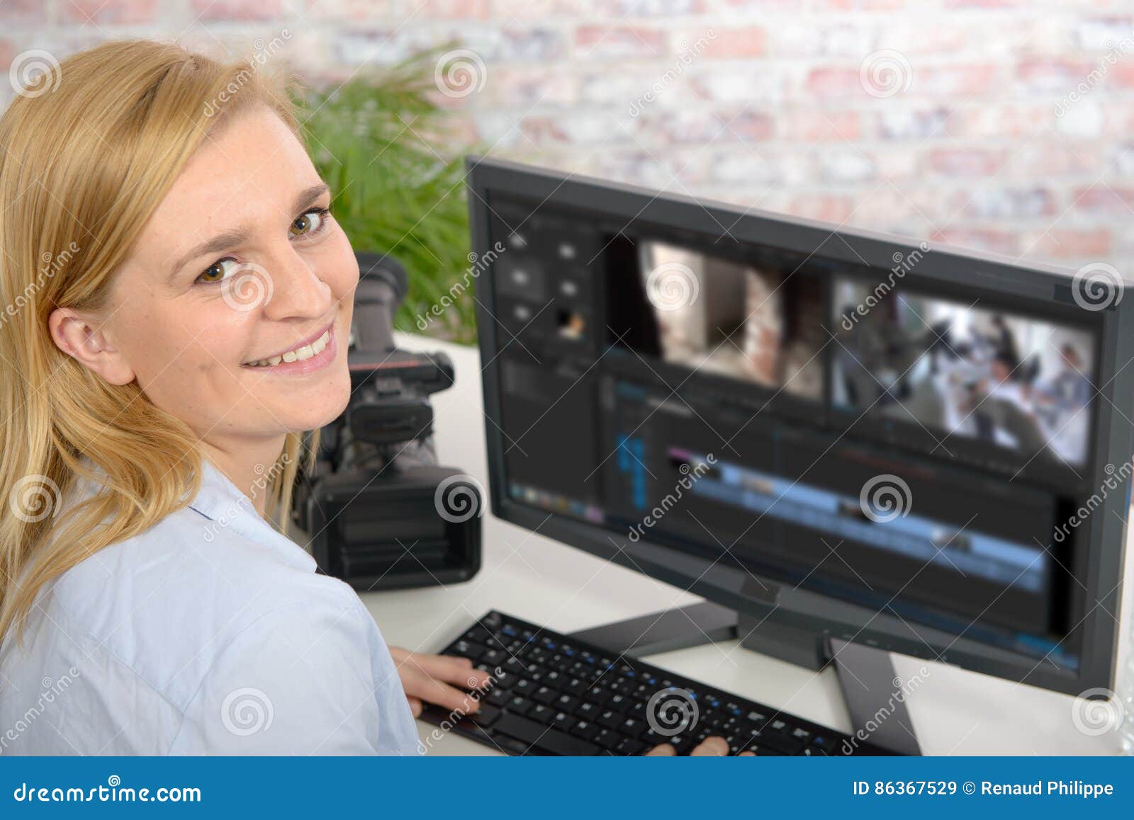 Young Female Designer Using Computer for Video Editing Stock Image ...